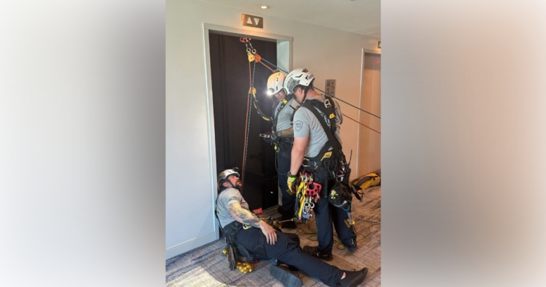 Orange County firefighters rescue two people trapped in elevator ...